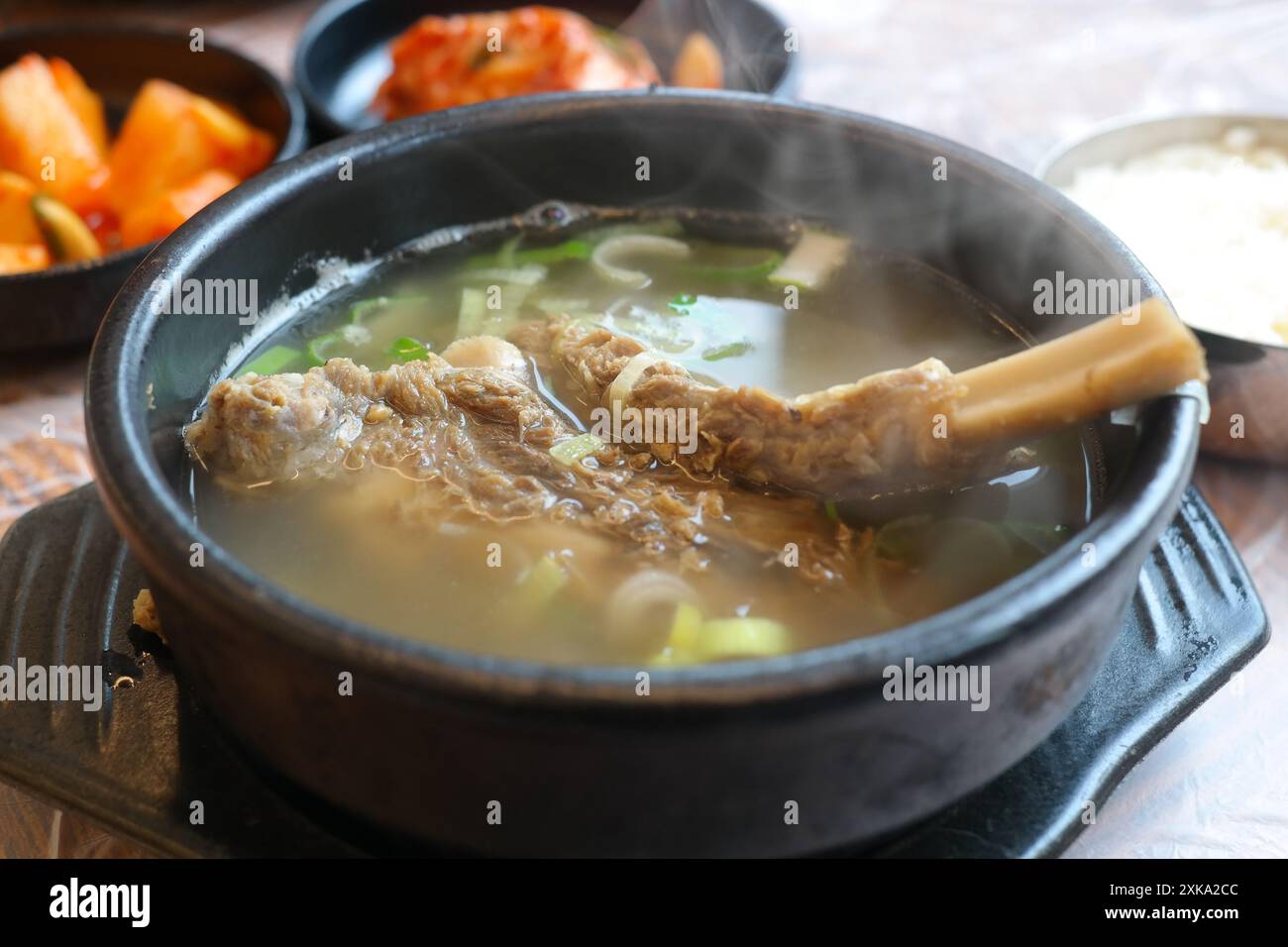 A traditional Korean soup dish made by boiling and seasoning large beef ...