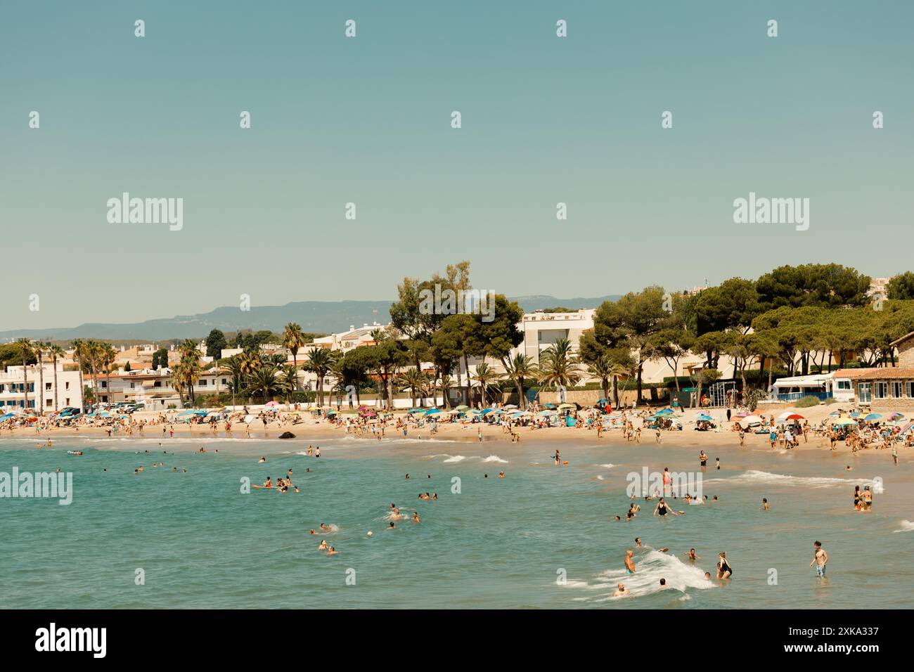 Sunny day on the beach in Spain Stock Photo - Alamy
