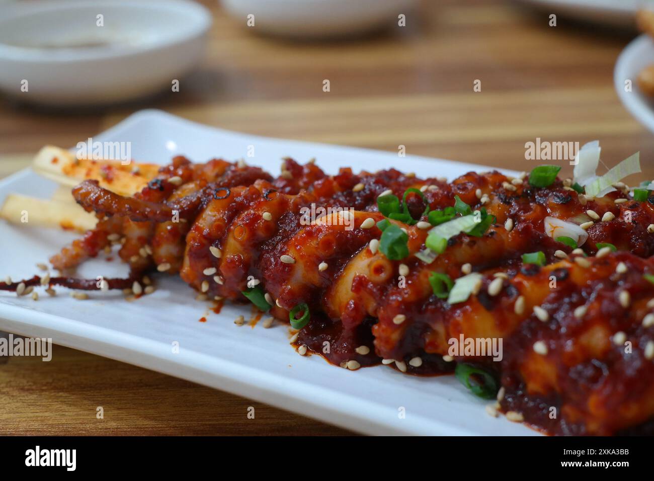 traditional Korean dish where octopus is marinated and grilled on ...