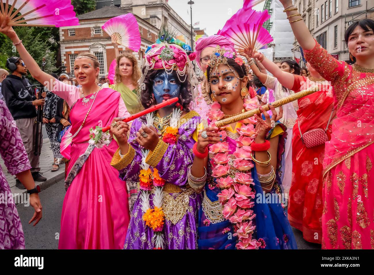 21st July 2024, London UK. Children representing Krishna and his ...