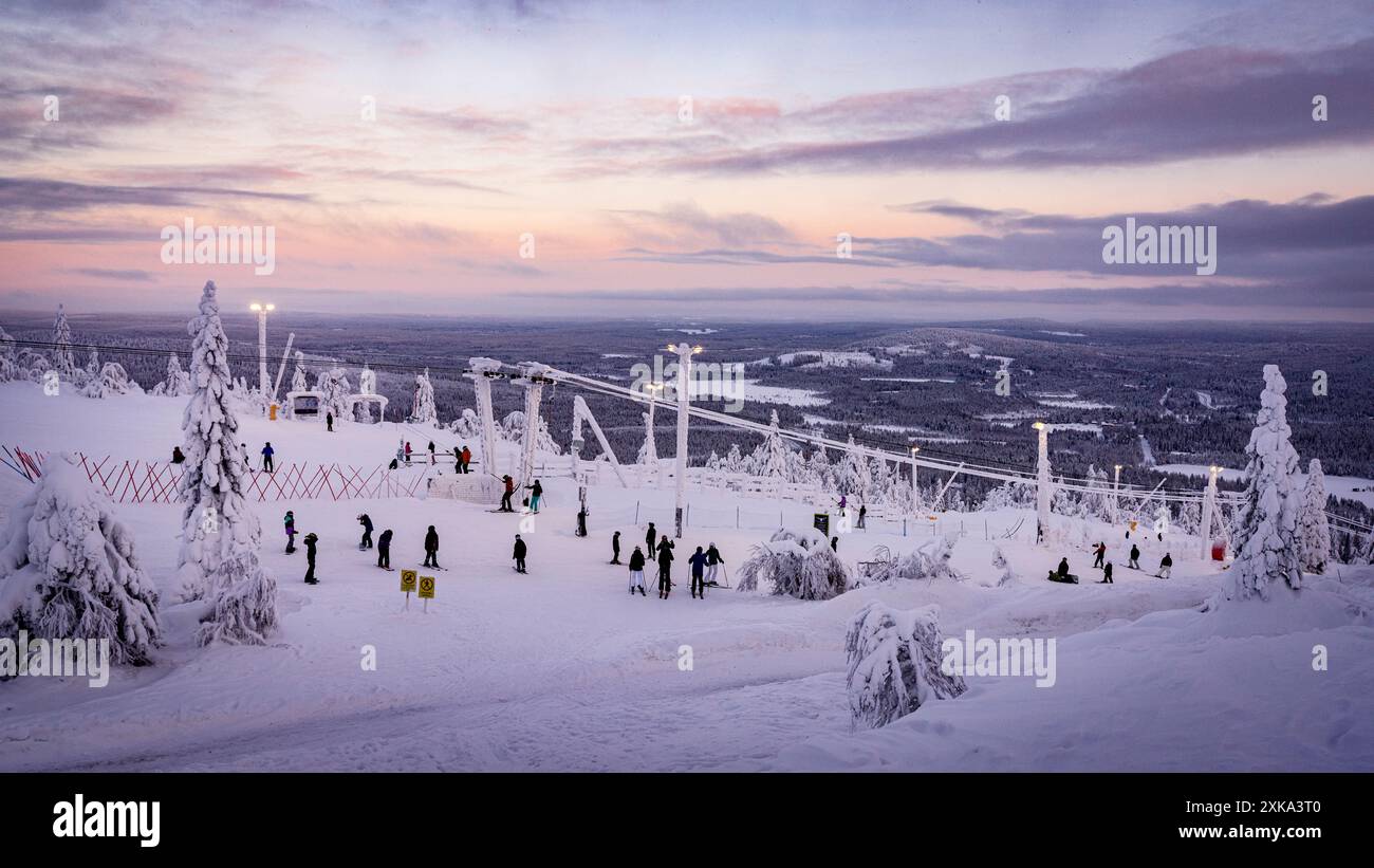 People skiing in the winter ski resort of Iso Syote, Lapland, Finland ...