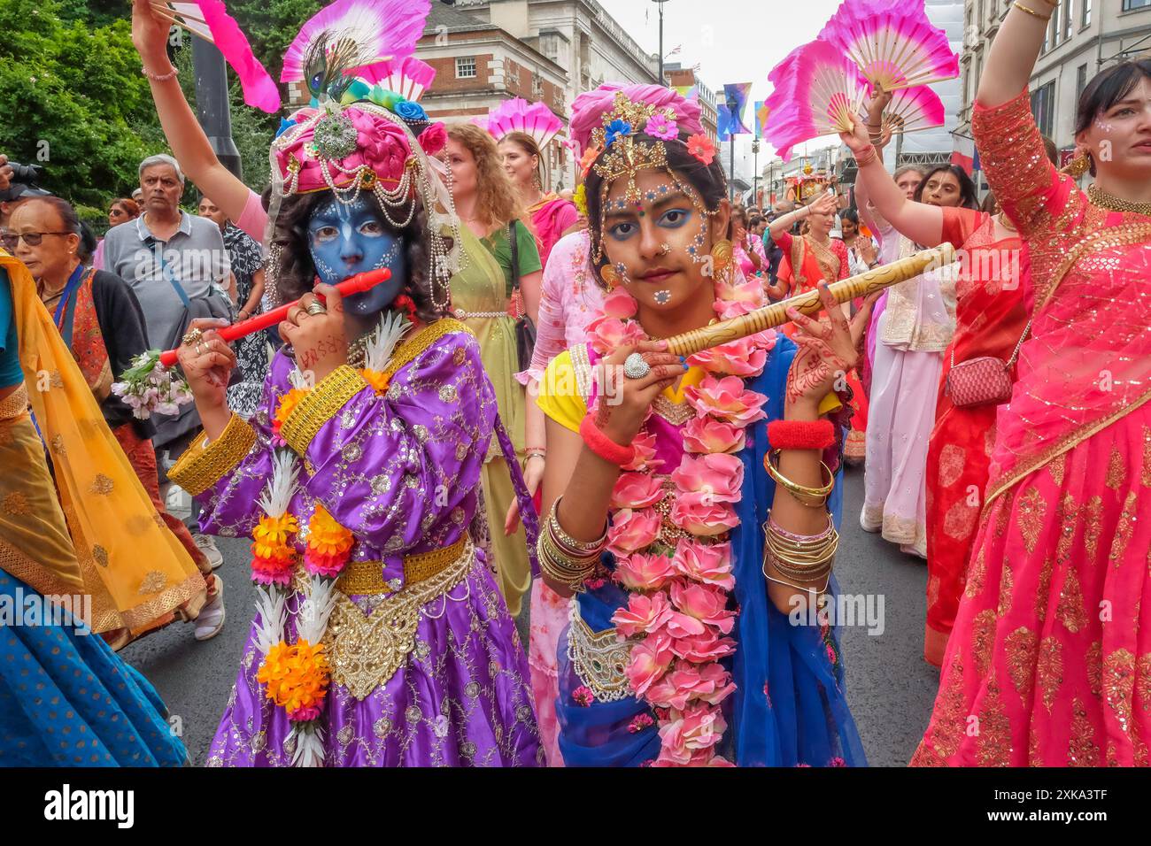21st July 2024, London UK. Children representing Krishna and his ...