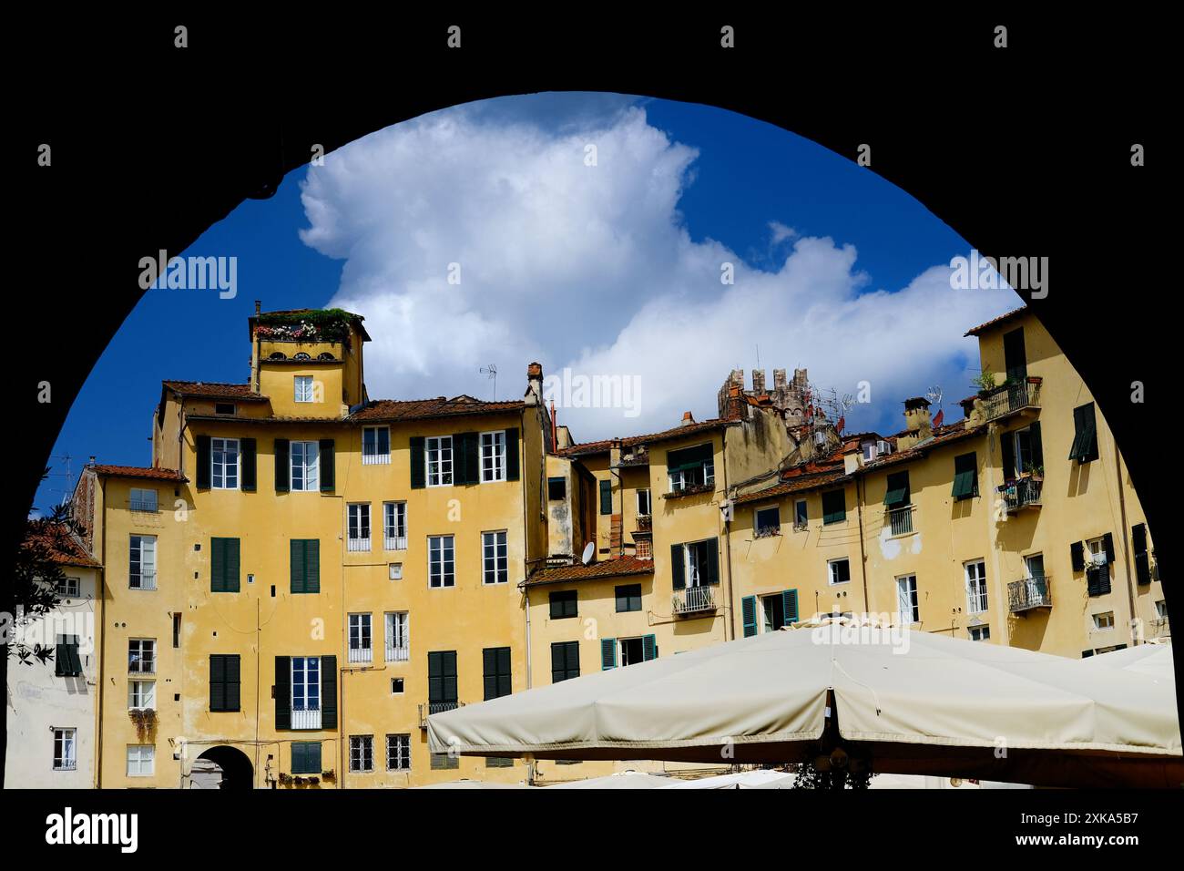 Lucca Amphitheater Square medieval buildings and St Fredianus ...