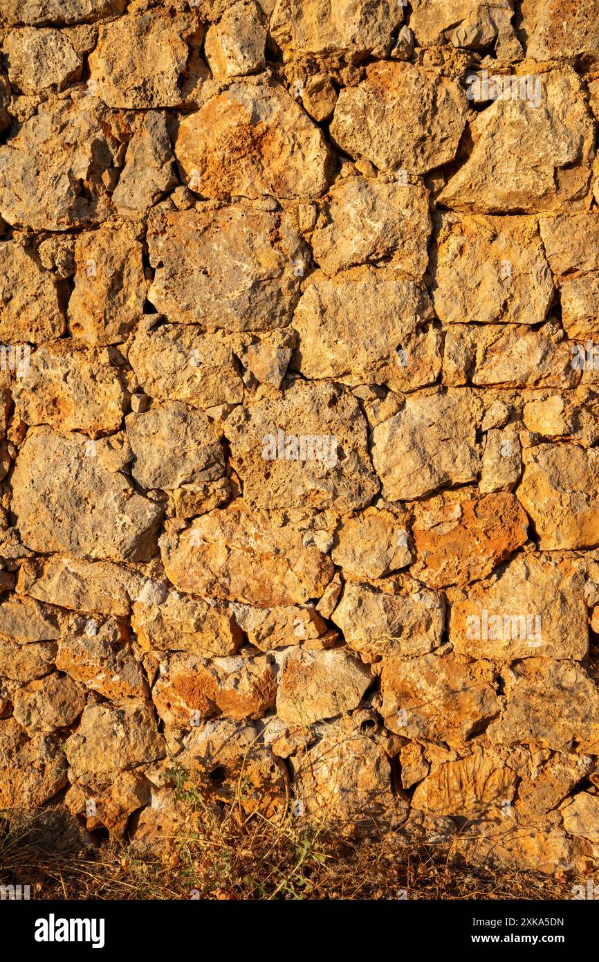 Natural rock wall, photographed at golden hour Stock Photo - Alamy
