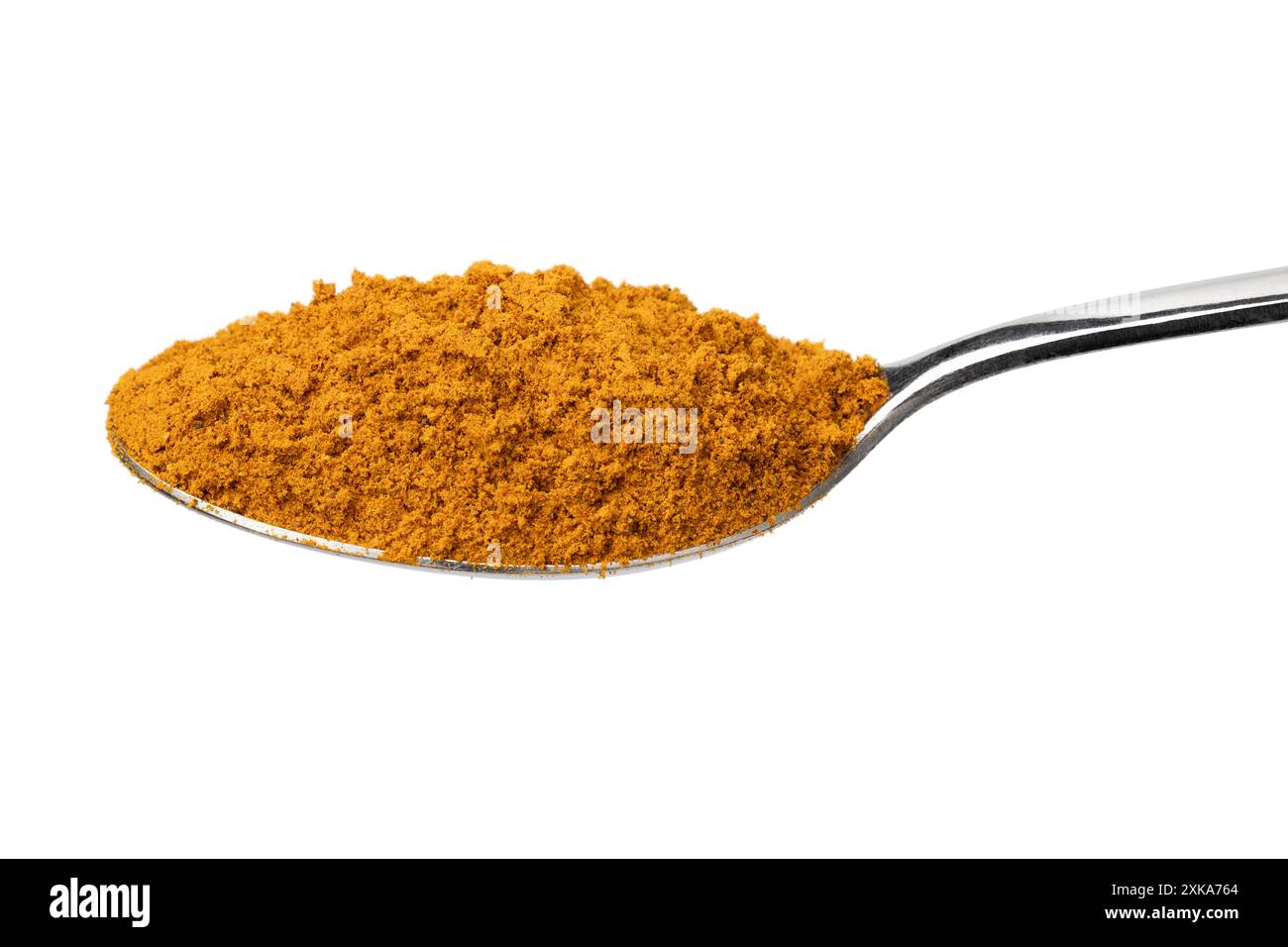 Metal spoon with traditional yellow Indian masala powder close up on ...