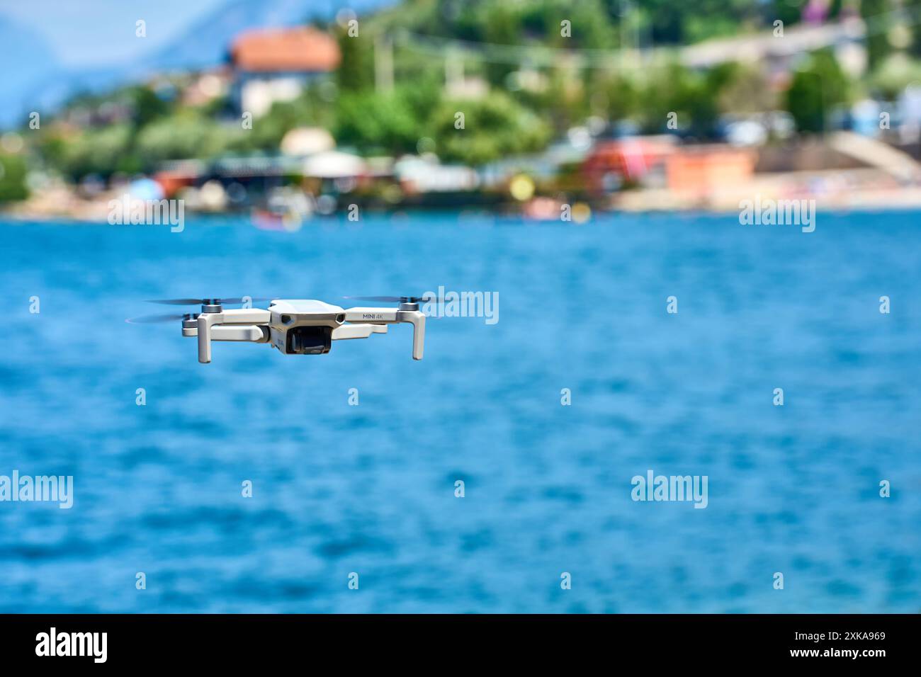 Malcesine, Lake Garda, Italy - July 20, 2024: A DJI Mini 4K drone ...