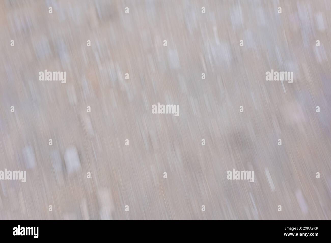 Blurry motion effect of an abstract textured background in neutral ...
