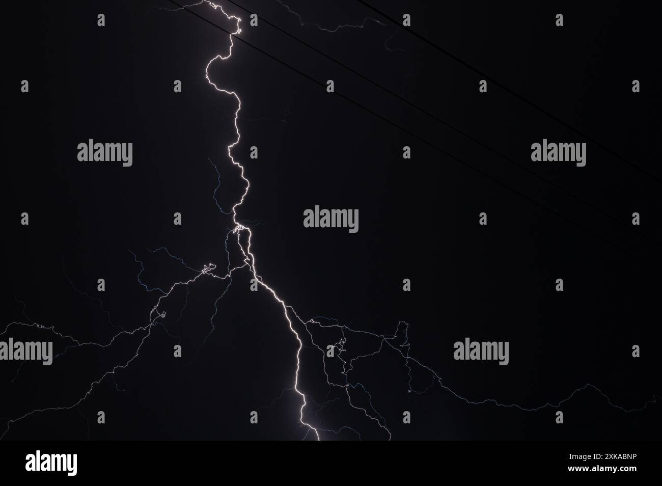 Lightning in the night sky. Thunderstorm and lightning in the night sky. Lightning on a pure ...