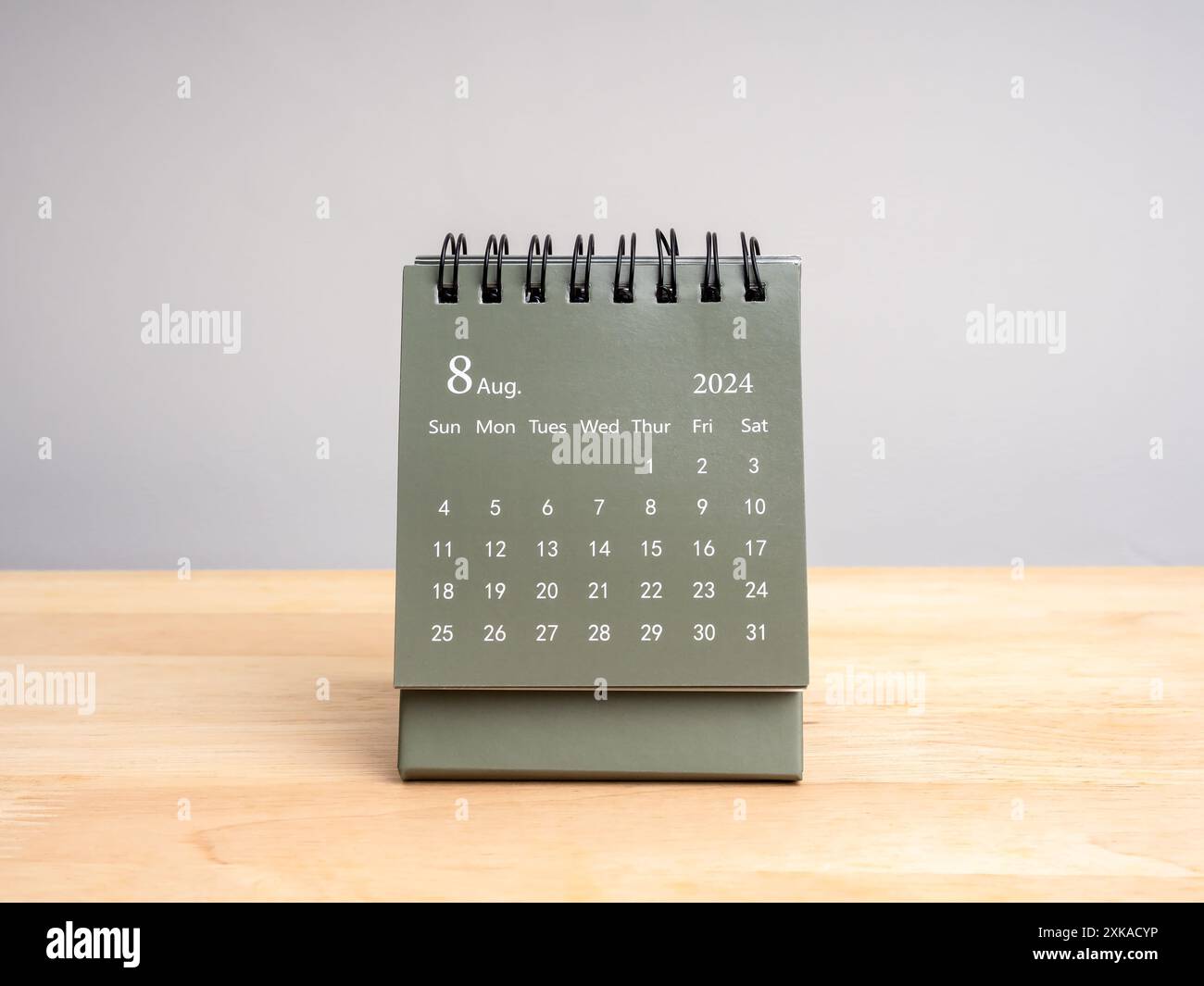 An August 2024 desk calendar for plan and reminder isolated on wooden ...
