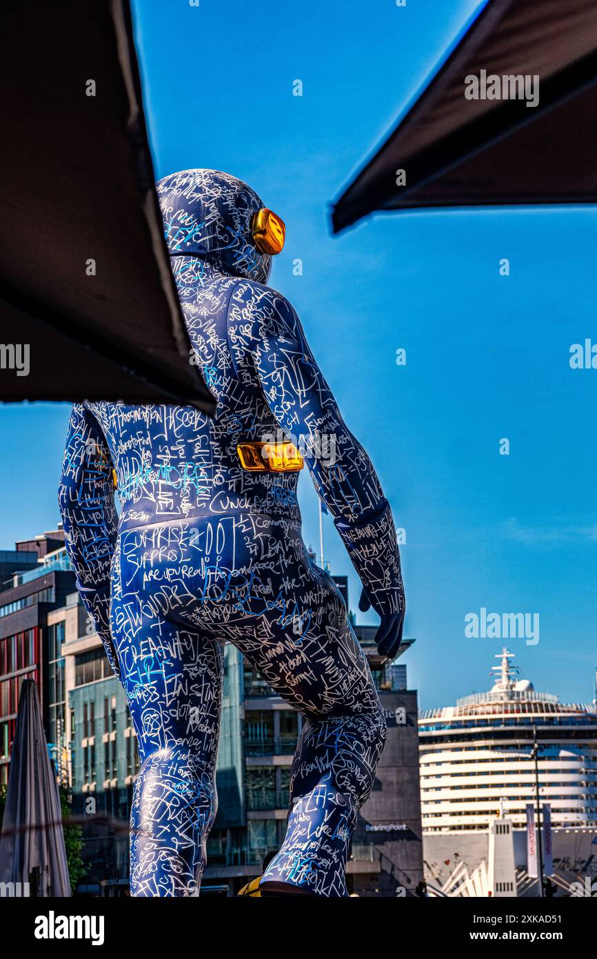 Blue Spaceman statue monument in Aker Brygge, Oslo Norway Stock Photo ...