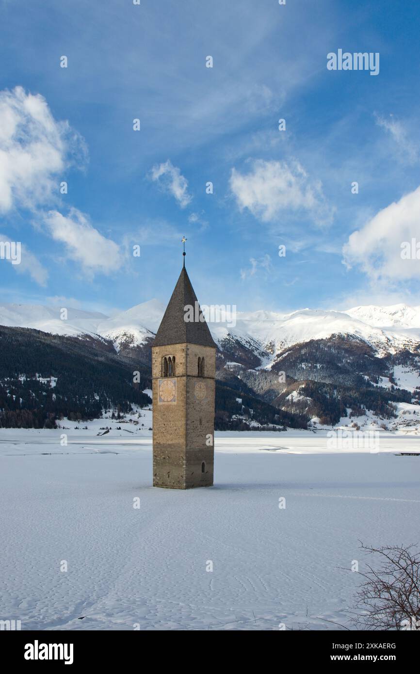 Frozen Lake Reschen with flooded 14th century church in December 2023 ...