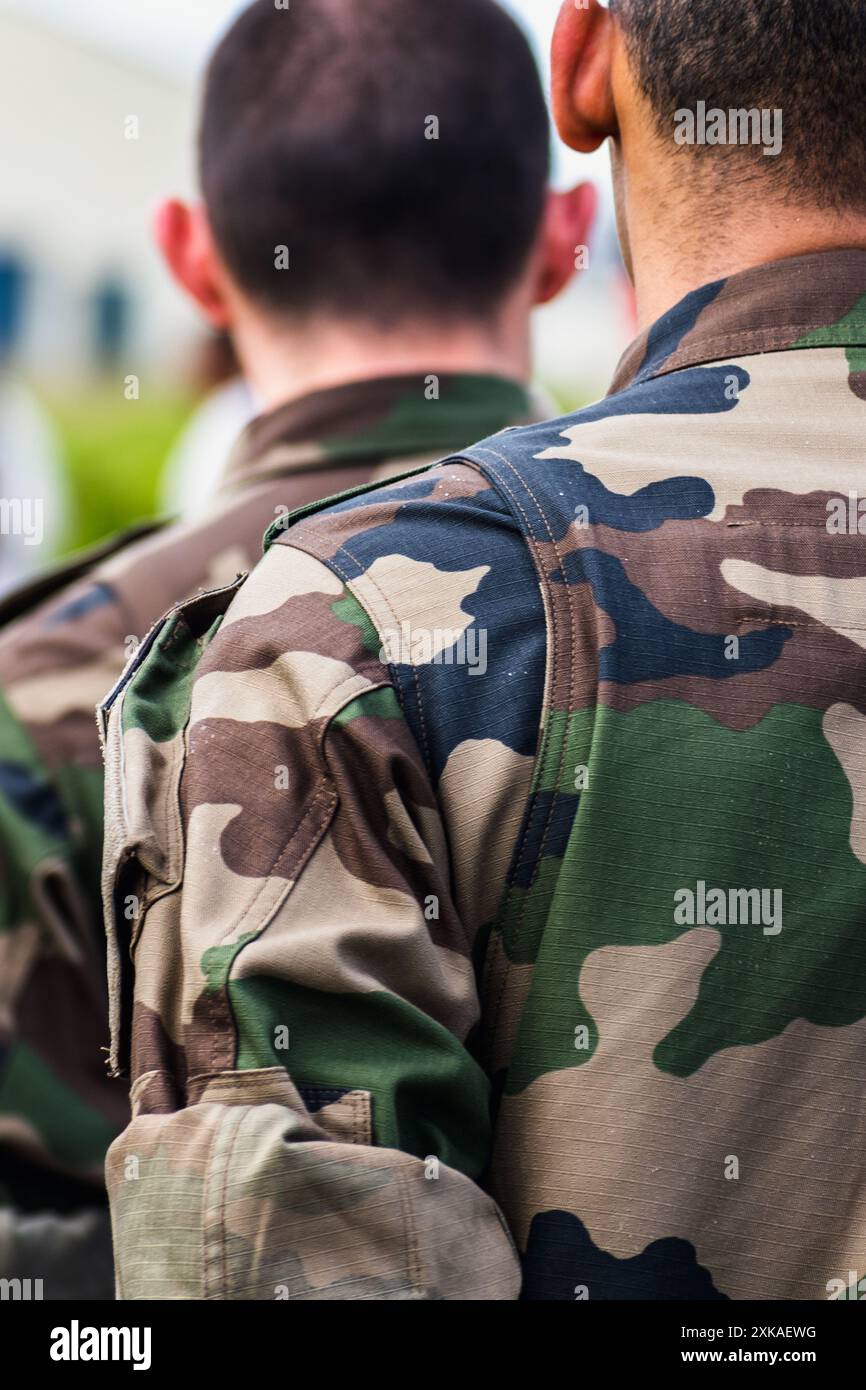 French soldier working in camouflage uniform, french army Stock Photo ...