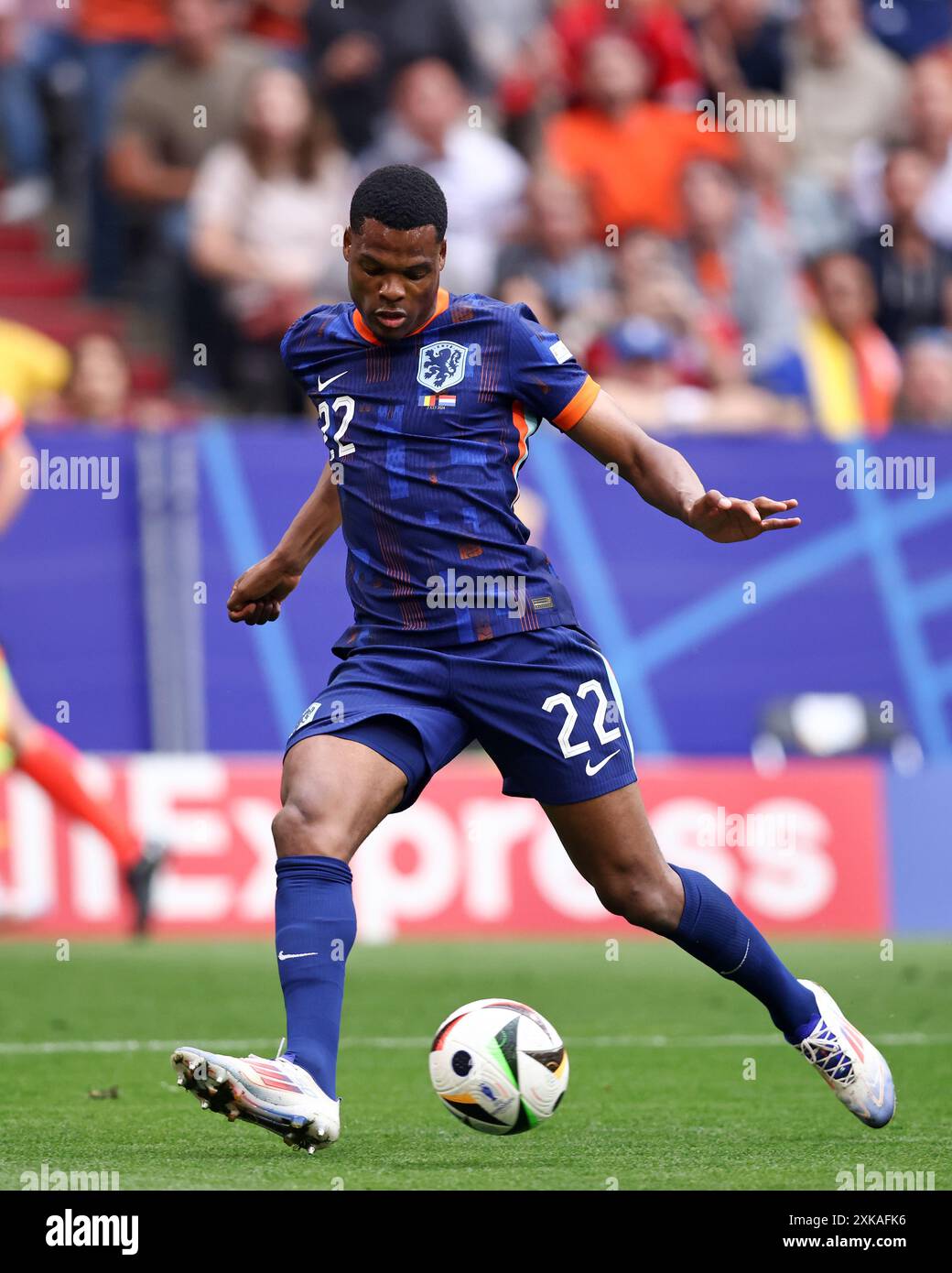 MUNICH, GERMANY - JULY 02: Denzel Dumfries of Netherlands runs with a ...