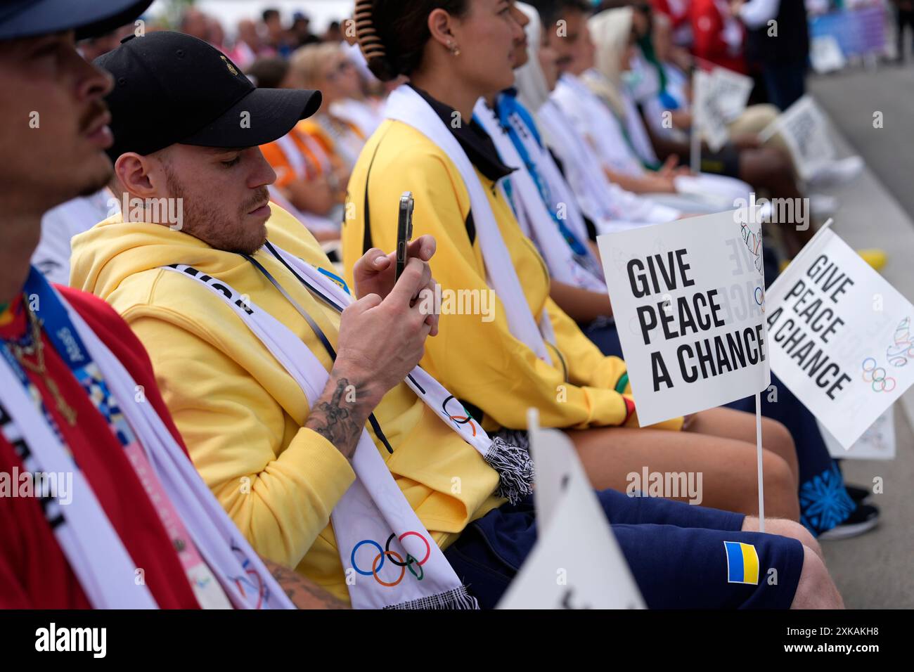 Oleg Verniaiev, an Ukrainian artistic gymnast, takes a photograph of ...