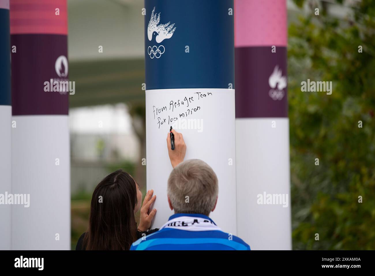IOC President Thomas Bach watches athlete of the Refugee Olympic Team ...