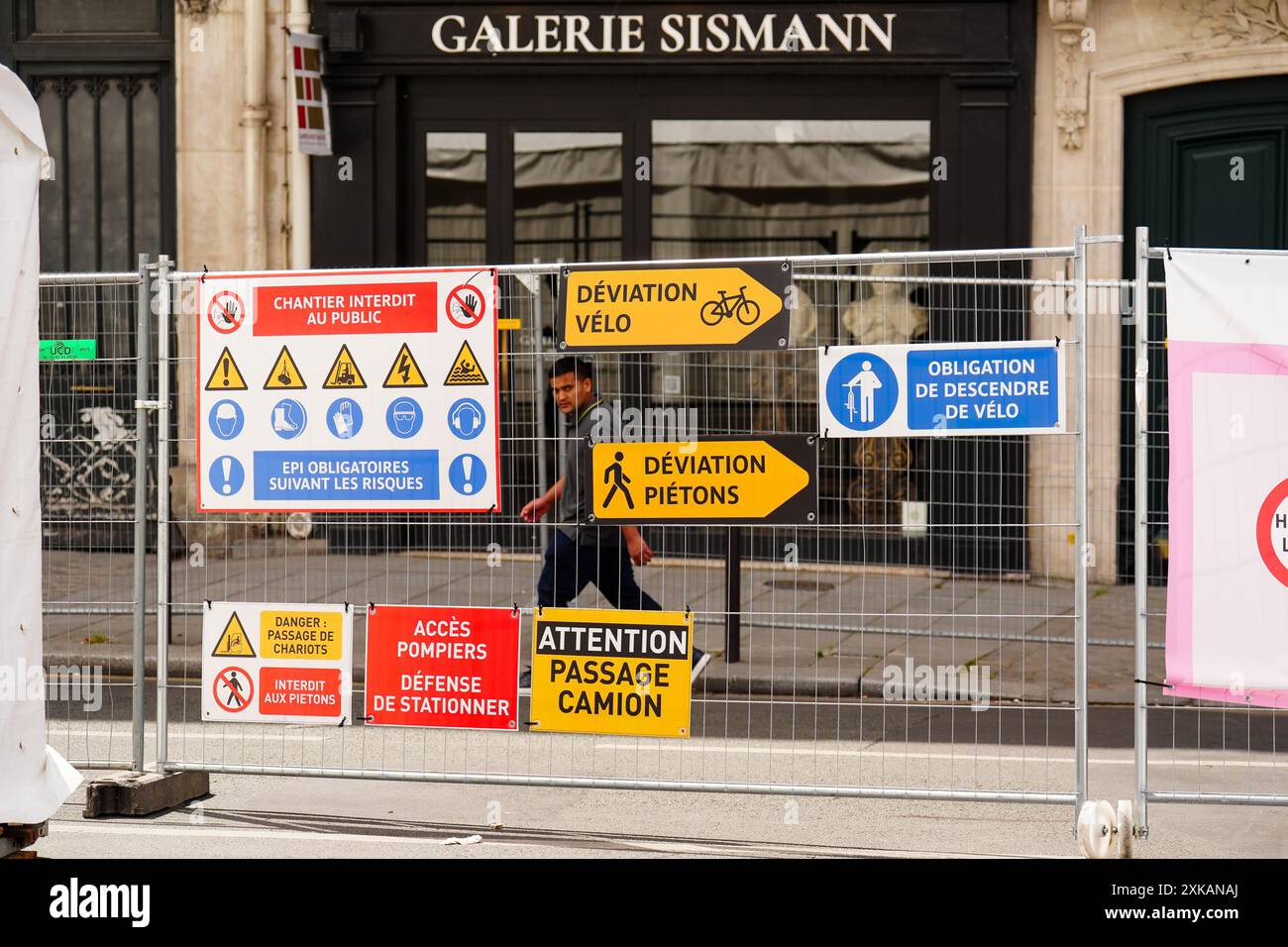 Perimeter fencing with directional signage near the river seine, paris ...