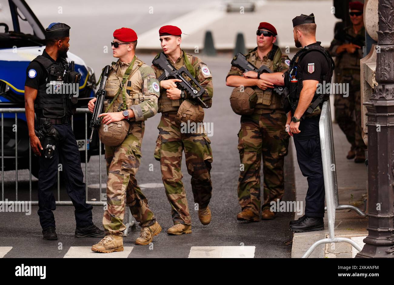 Armed guards on patrol near the River Seine, Paris. The Opening ...