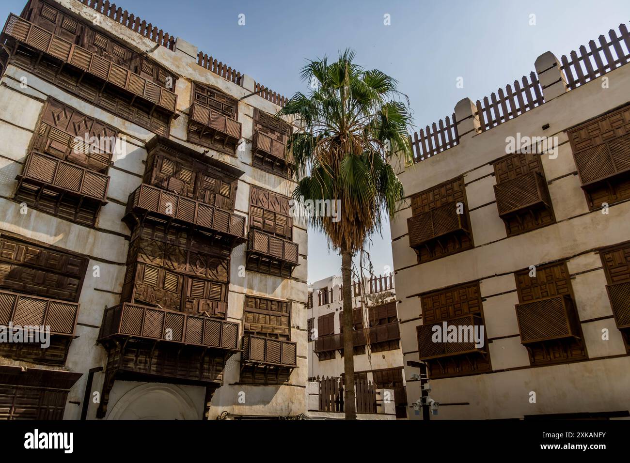 The palm tree between two old buildings in historic Jeddah old town (Al ...