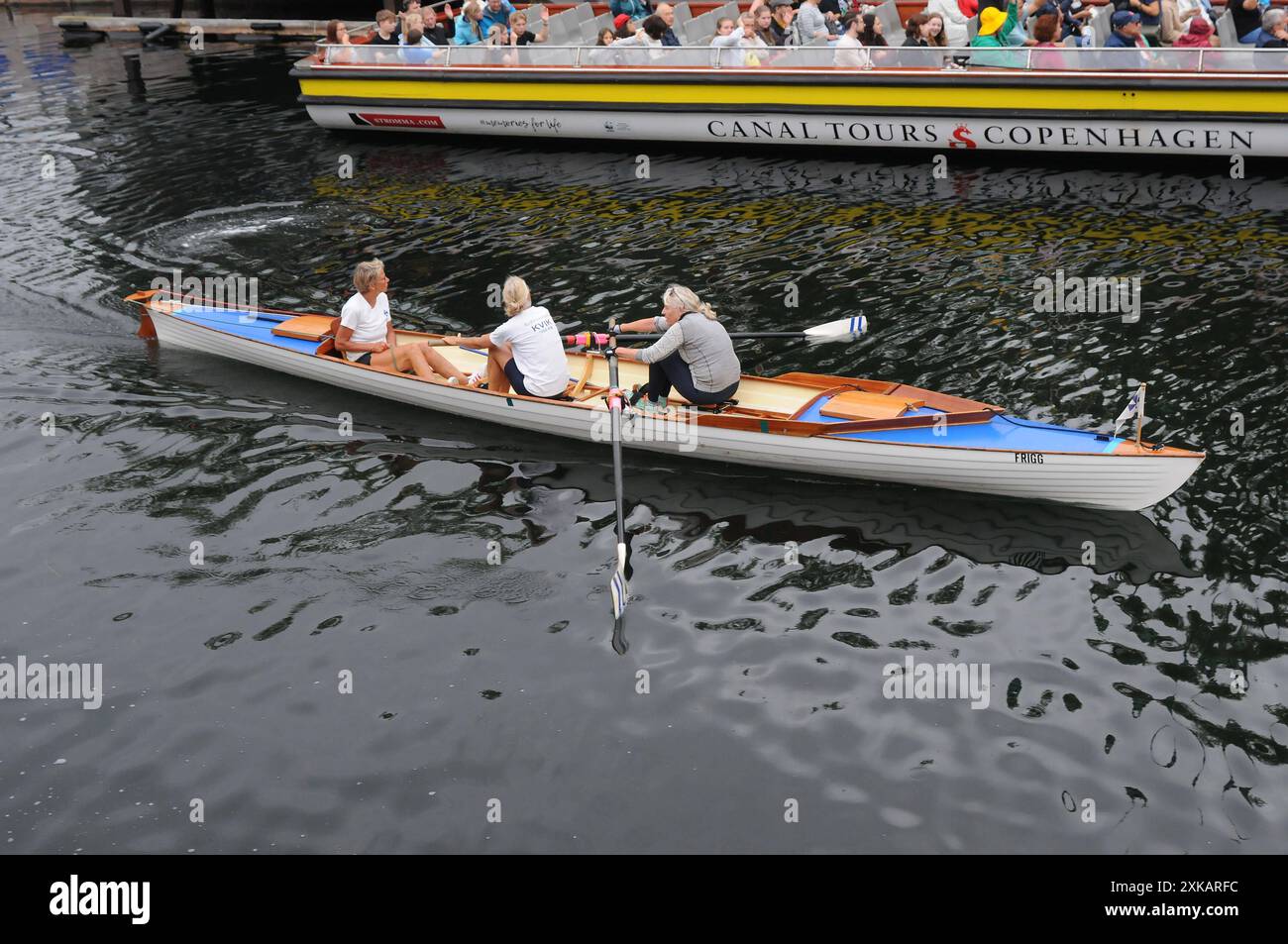 Copenhagen/ Denmark/22 July 2024/Female danes boaT rowing as ports in ...