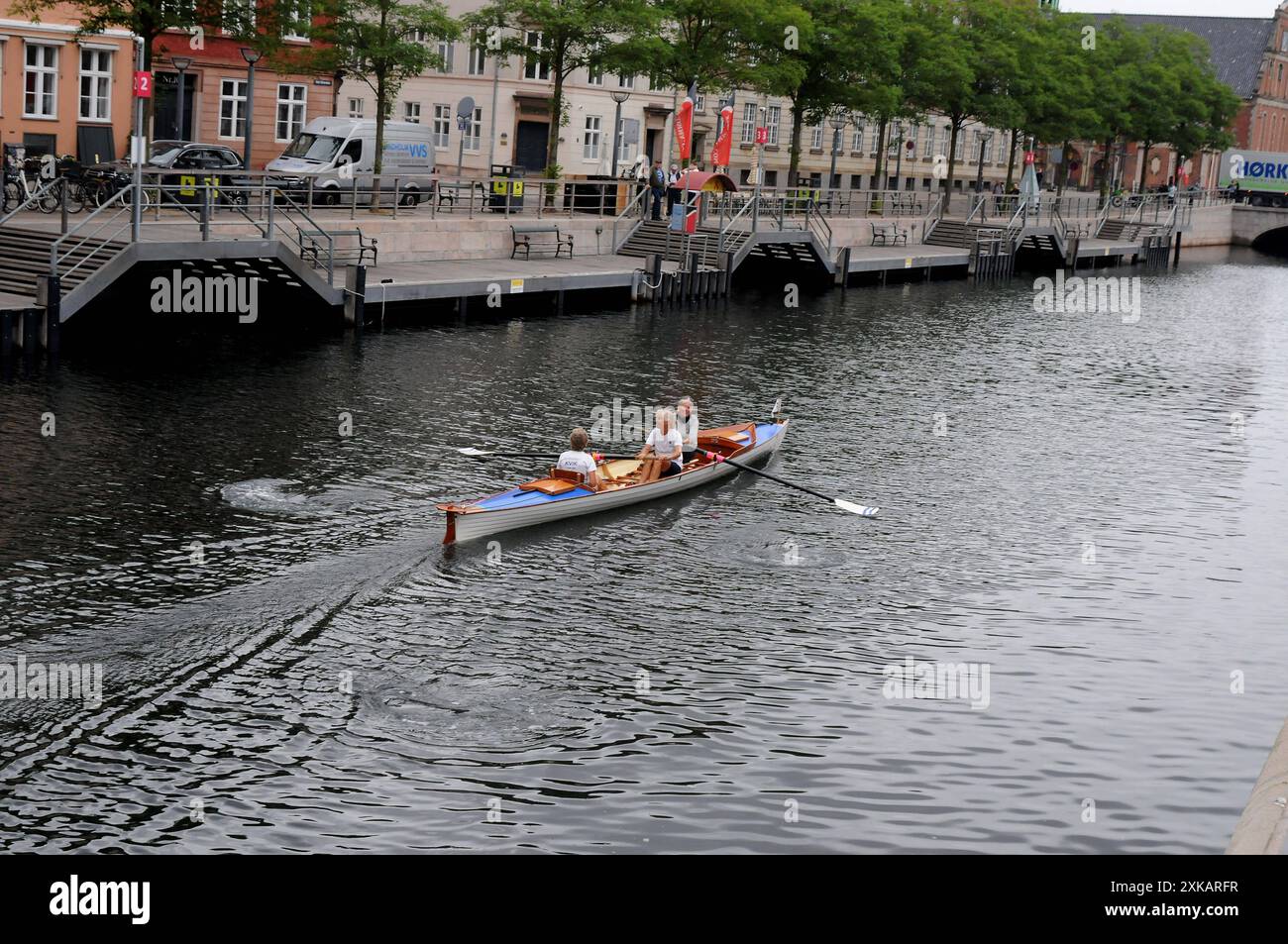Copenhagen/ Denmark/22 July 2024/Female danes boaT rowing as ports in ...