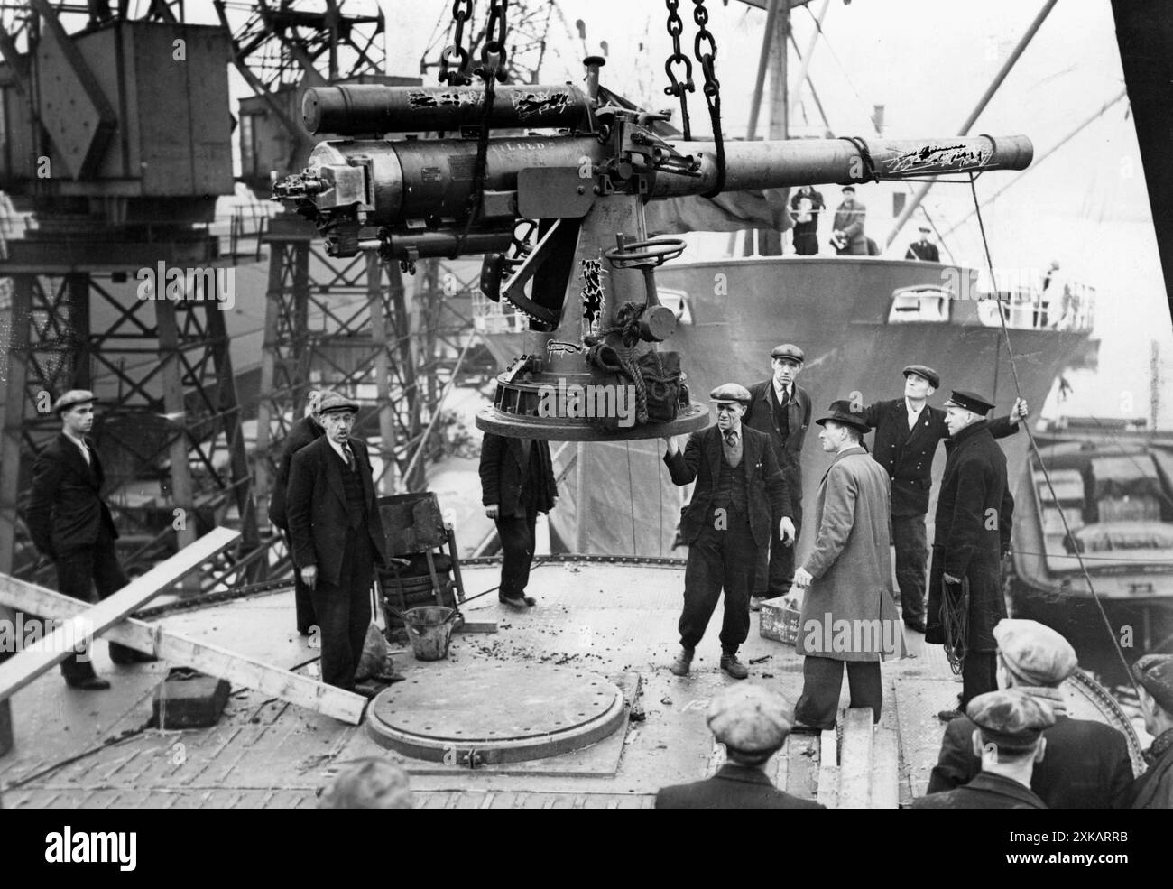 A gun is installed on a British merchant ship. Undated photo [automated ...