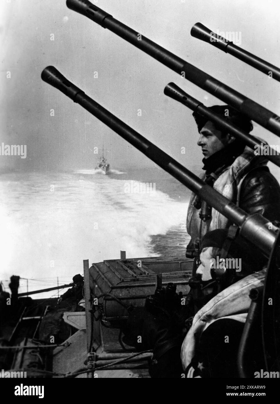 Lookout on the aft anti-aircraft quadrant on board a smaller unit of ...