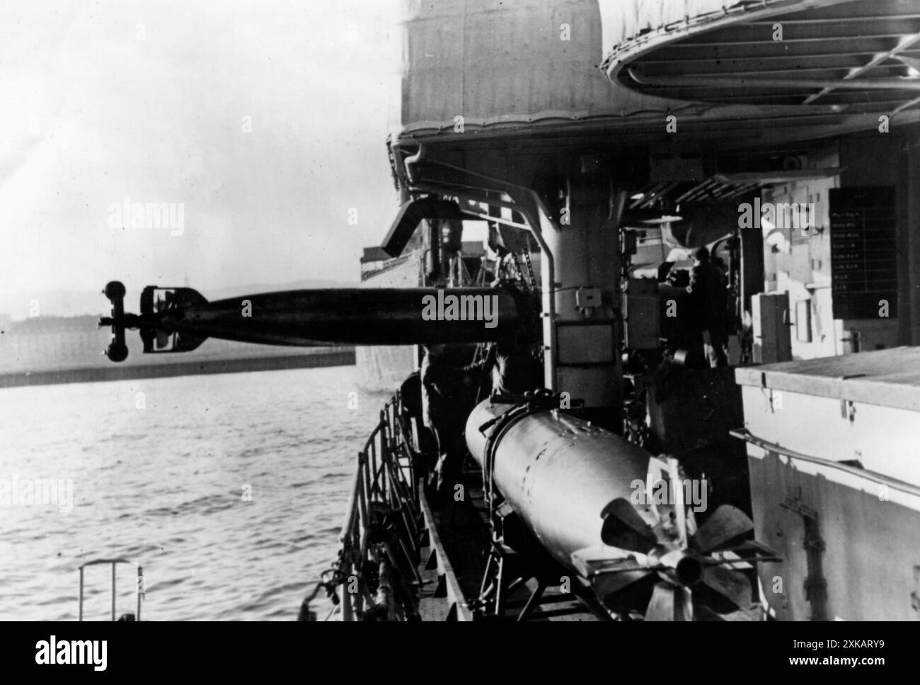 A torpedo is loaded into the launch tubes. Photo: Fröhlich. [automated ...
