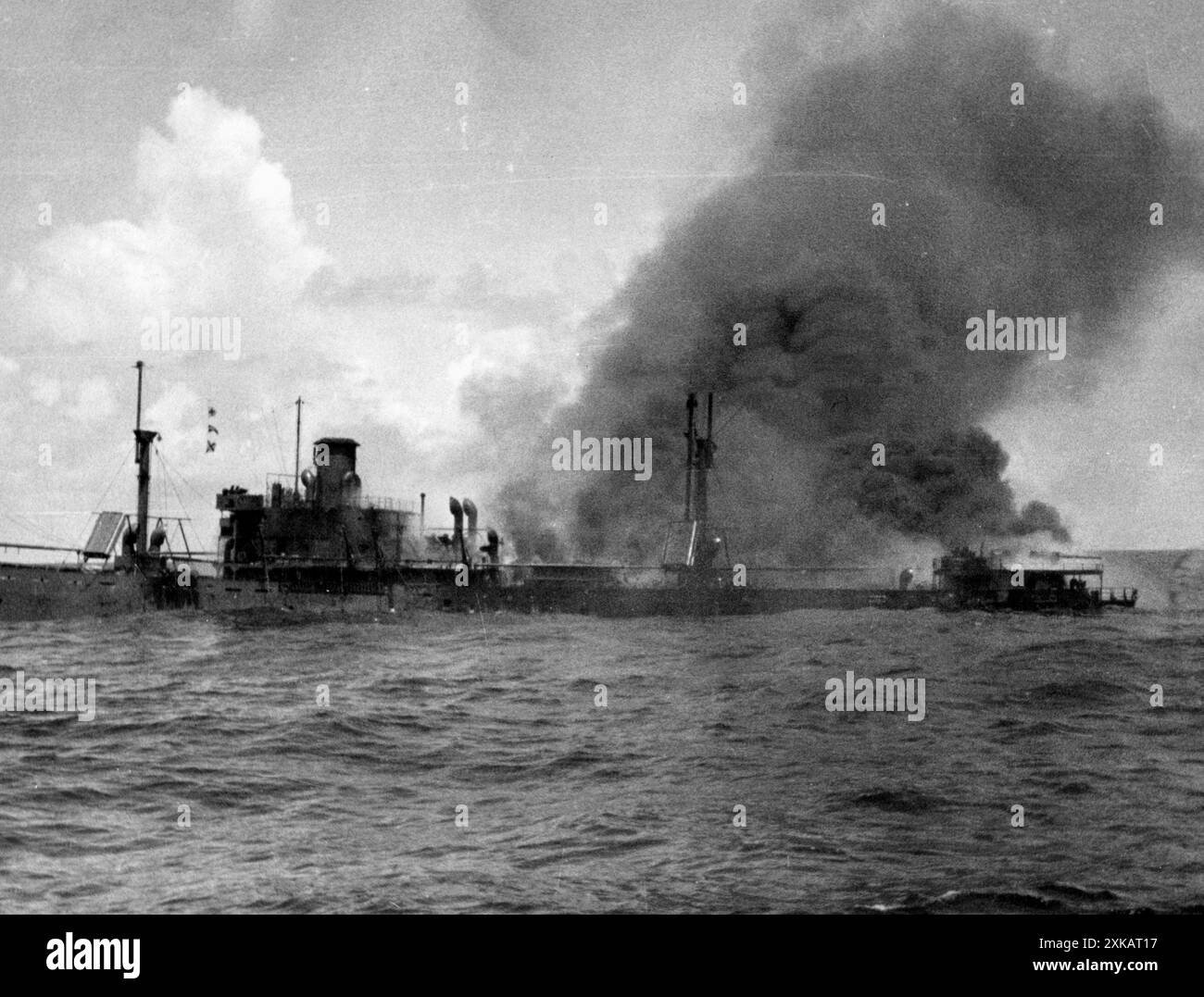 Allied ship sinking after a torpedo attack by a German submarine ...