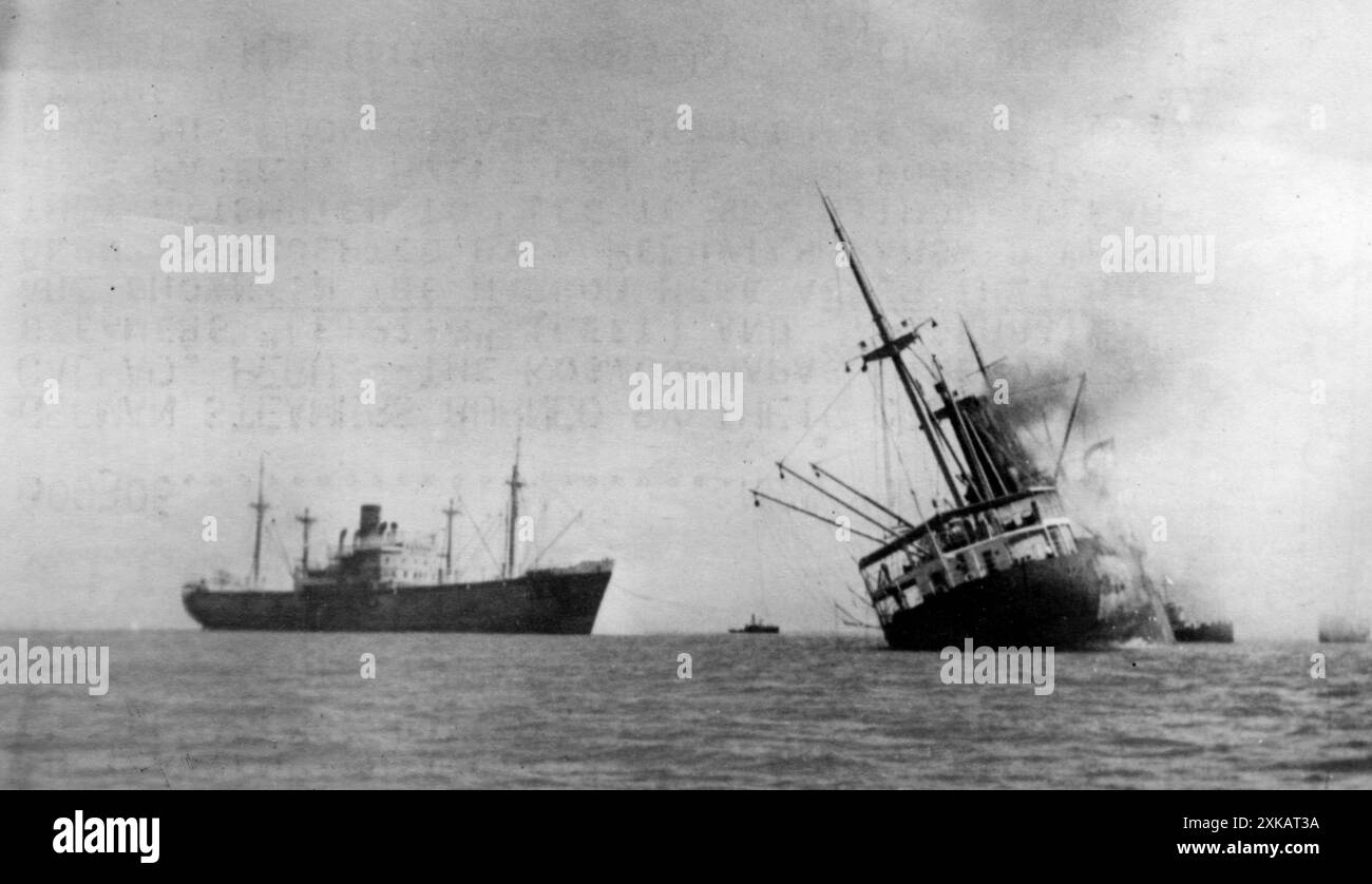 Two German cargo ships are sunk by their crews in the port of Calau in ...
