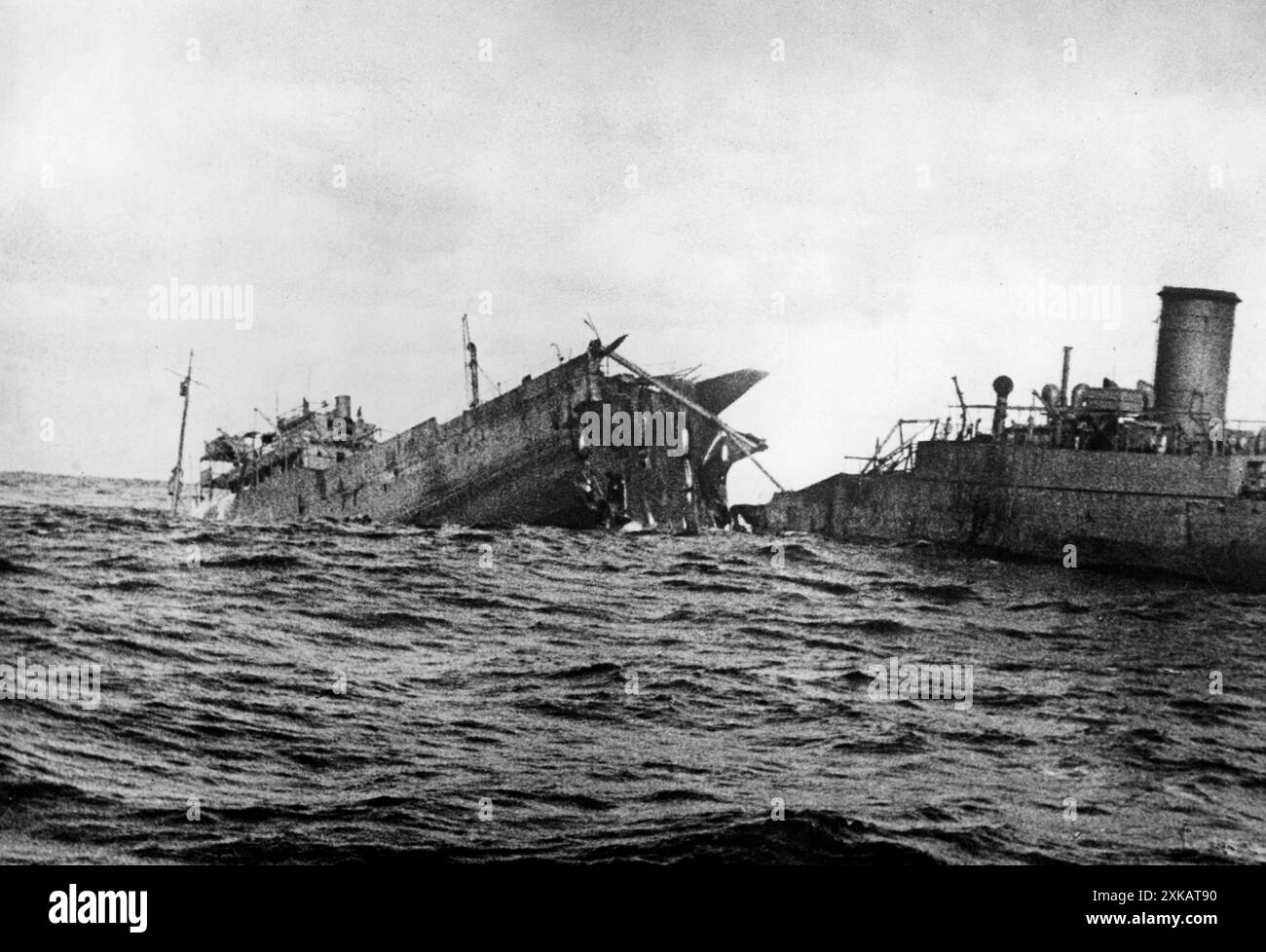 British tanker torn in half by a torpedo from a German submarine in the ...