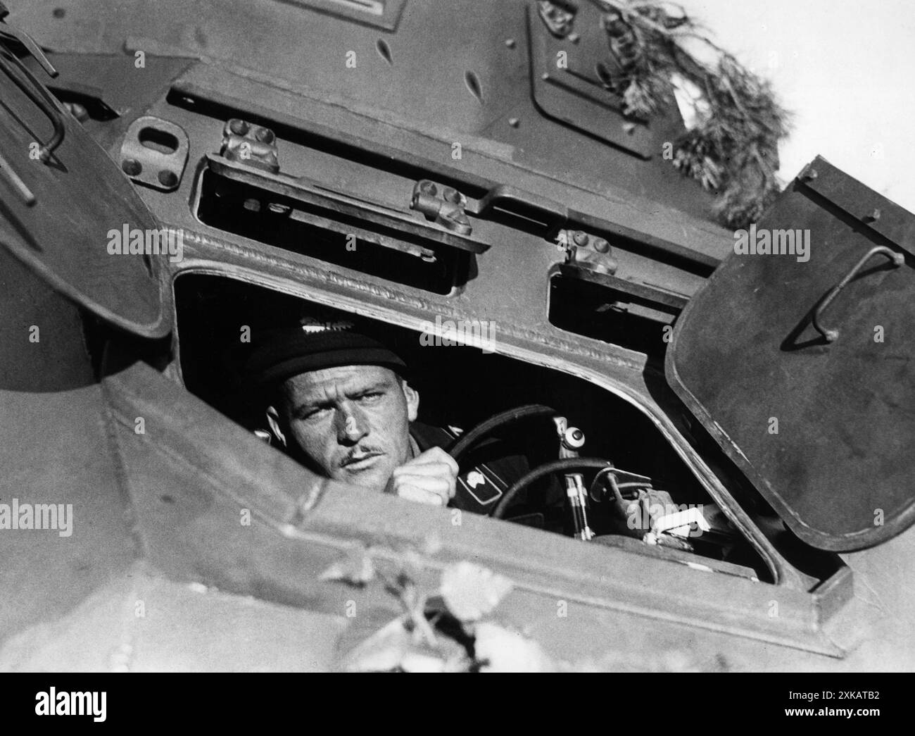 Driver in the open hatch of a German scout car. [automated translation ...