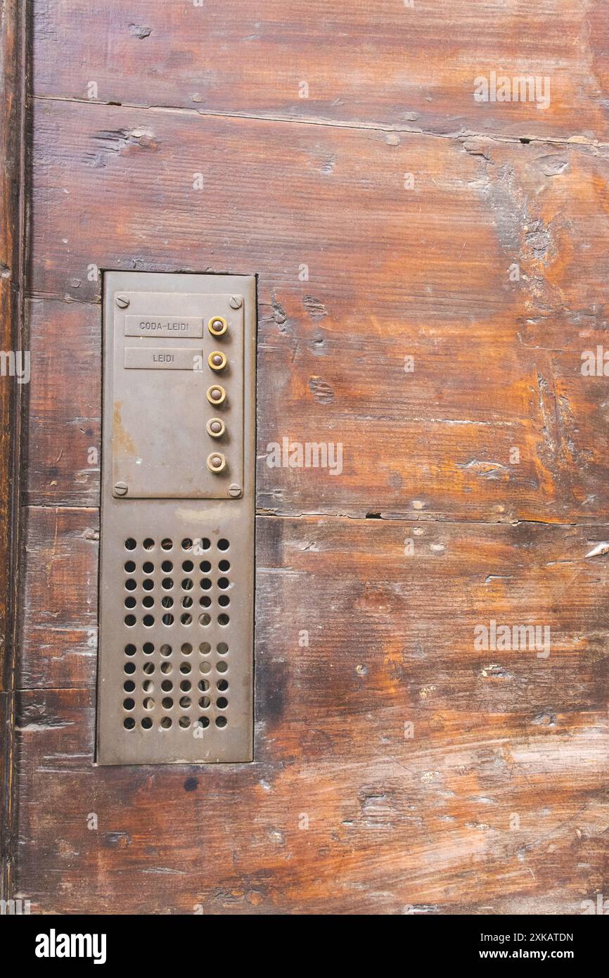 A rustic, rusty intercom doorbell system for flats and apartments on a ...