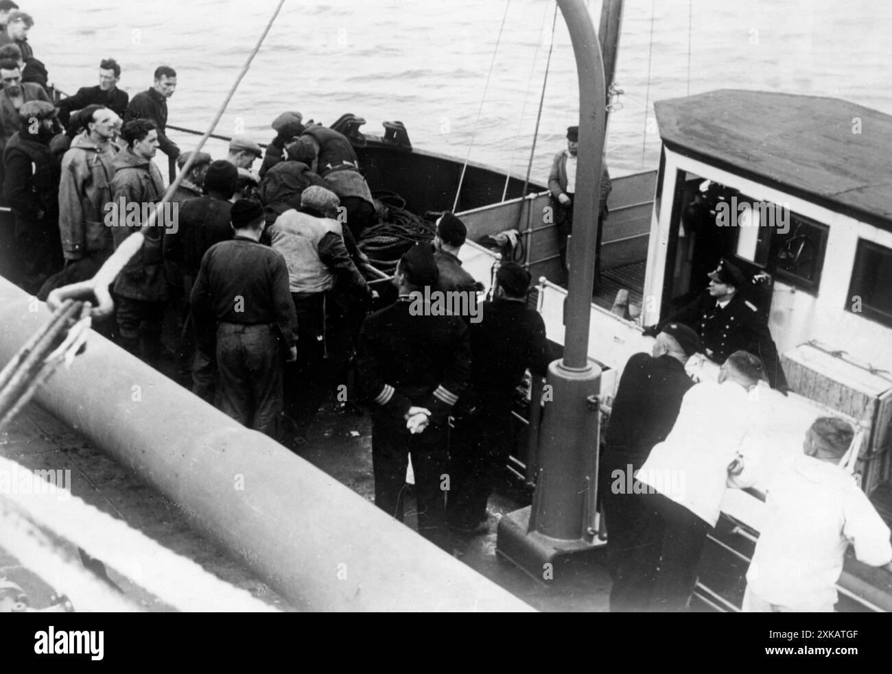 British sailors from sunken ships are handed over to a German auxiliary ...