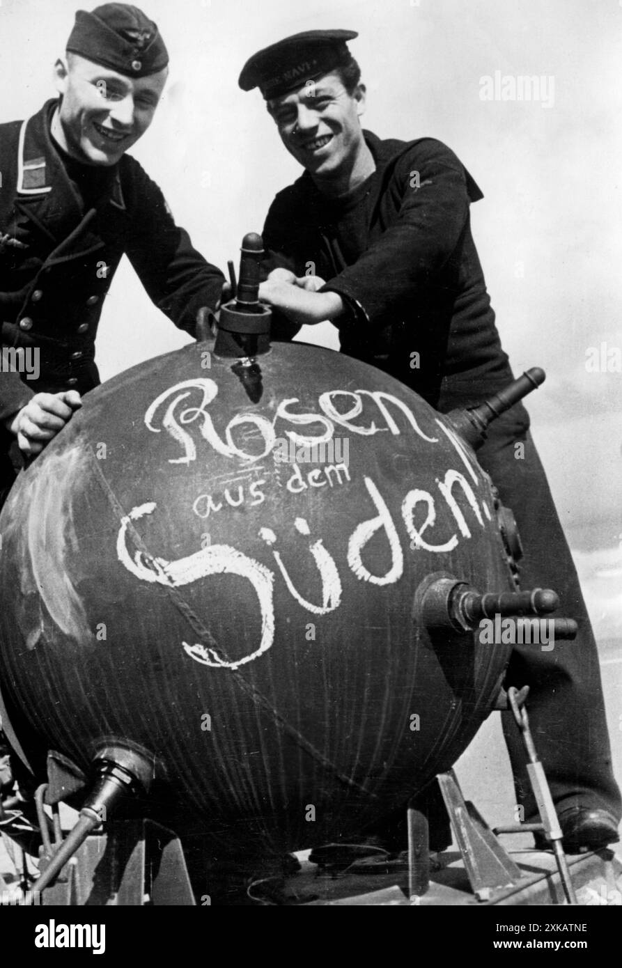 "A German and an Italian sailor with a sea mine bearing the inscription ...