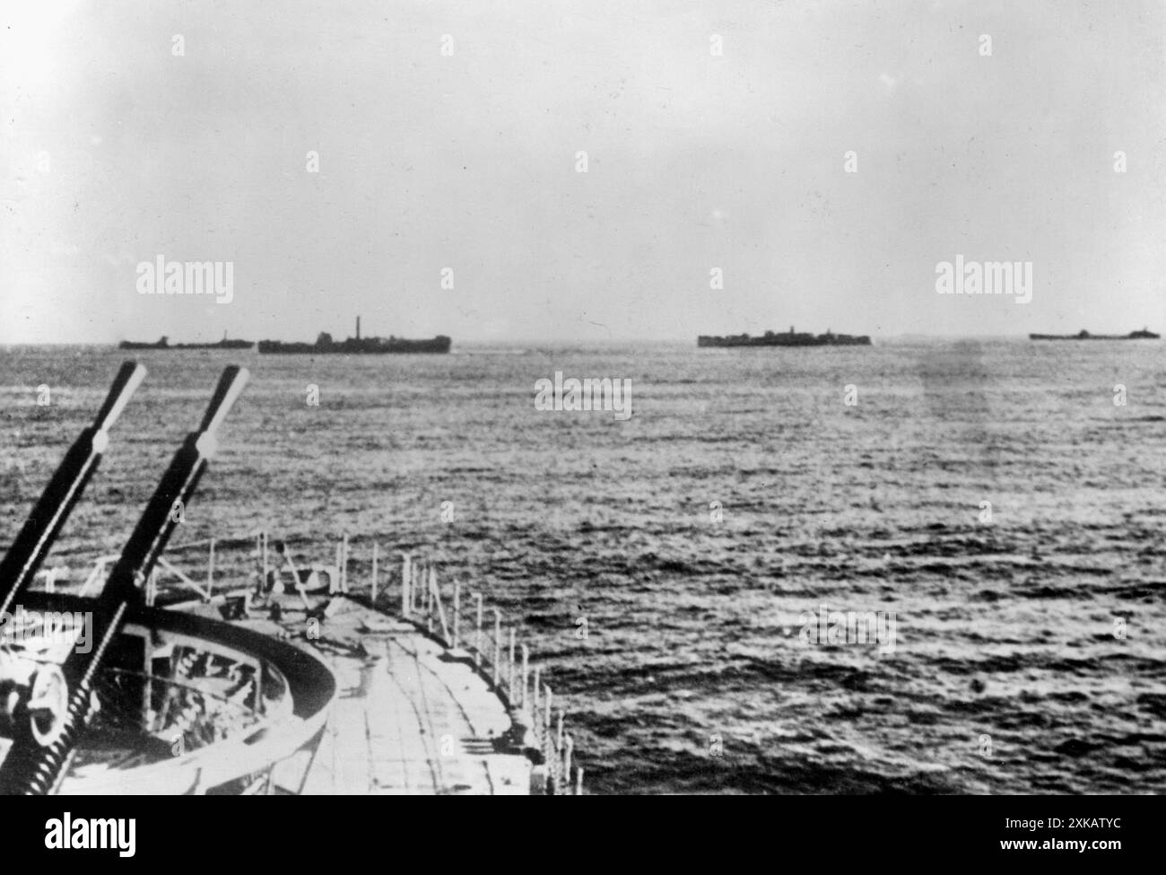 Merchant ships in a convoy, photographed from a French warship ...