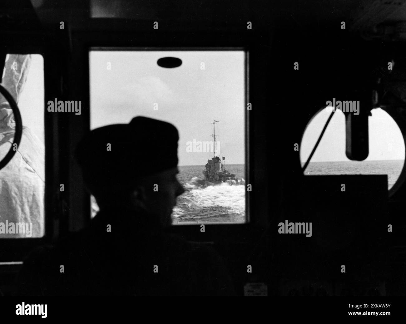 View from the driver's cab of a German minesweeper onto the ship ahead ...