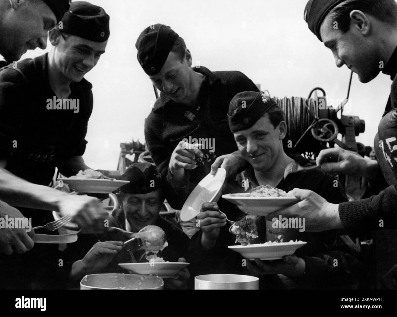 Sailors eating. Undated photograph. [automated translation] Stock Photo ...