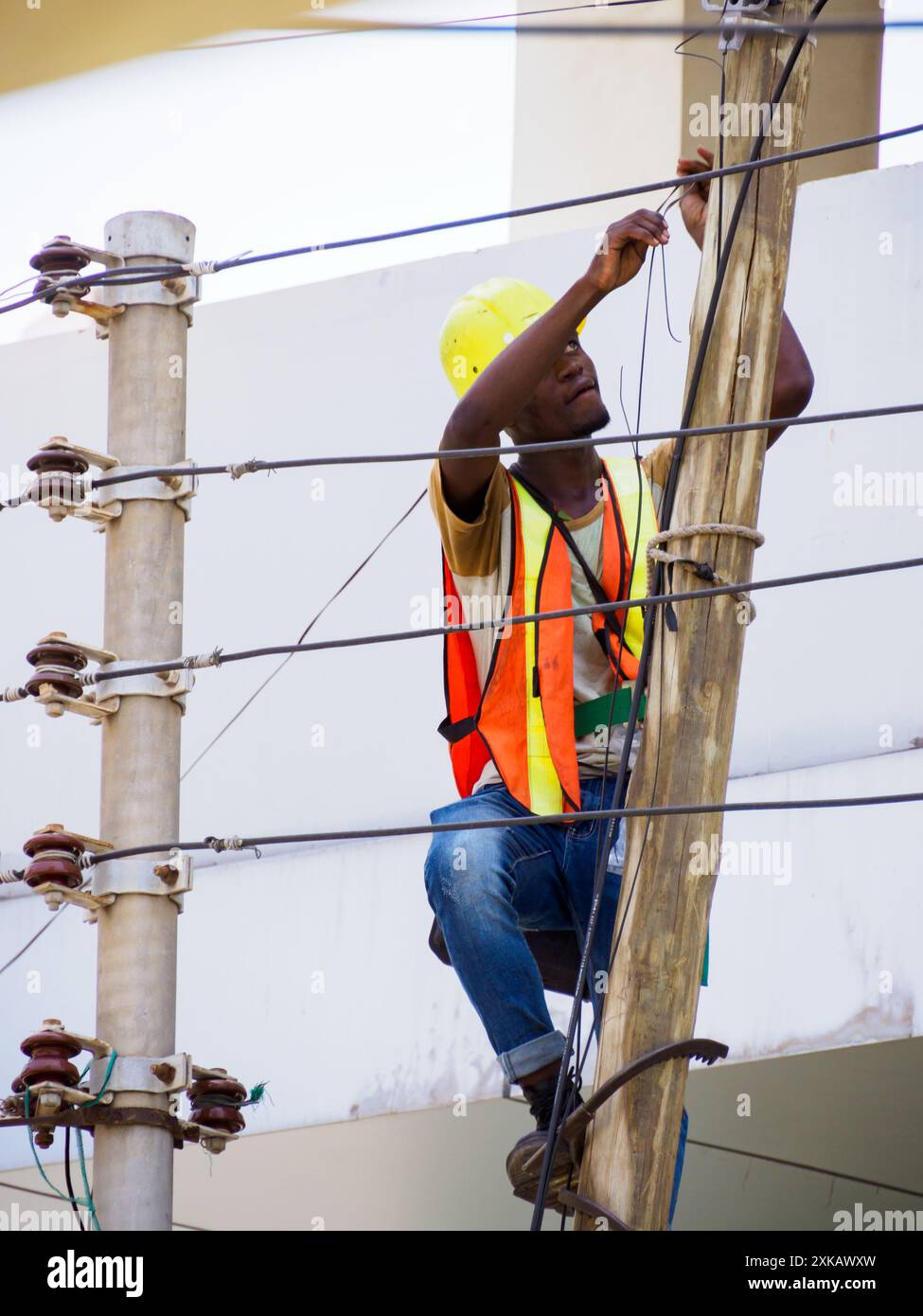 Dar es Salaam, Tanzania - February 2021: African man mending ...