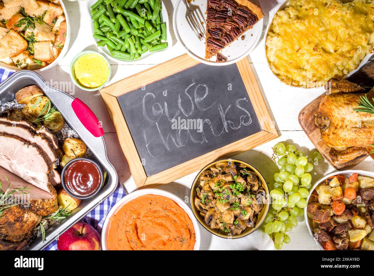 Thanksgiving dinner table with new traditional thanksgiving food ...