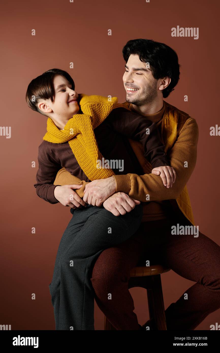 A father and son share a heartwarming moment, both smiling brightly ...