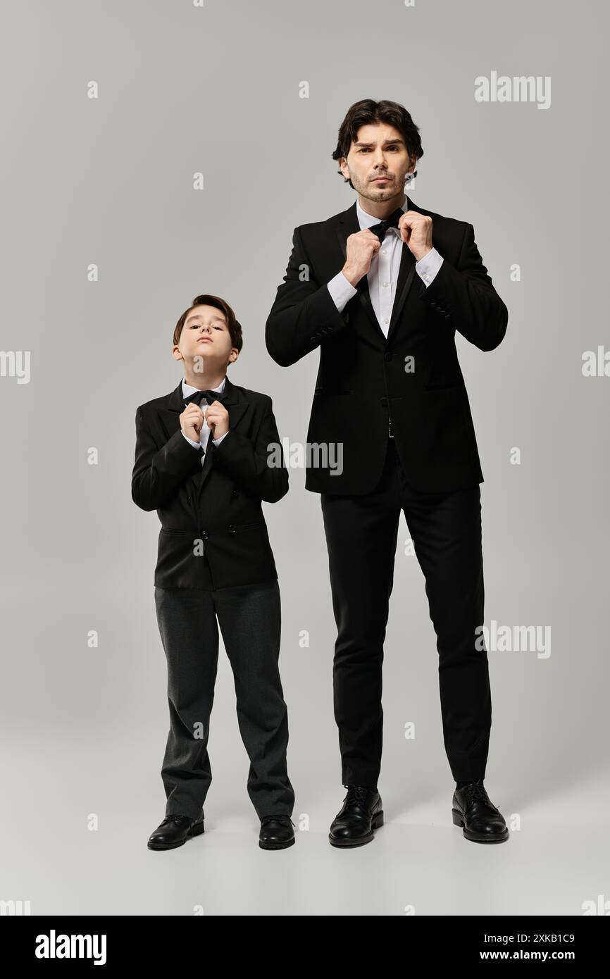 Father and son wearing bow ties hi-res stock photography and images - Alamy