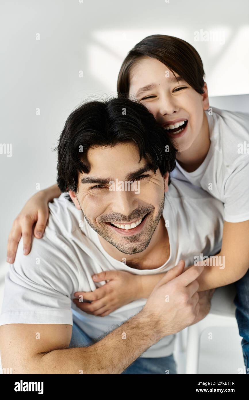 Parent joyfully lifting child hi-res stock photography and images - Alamy