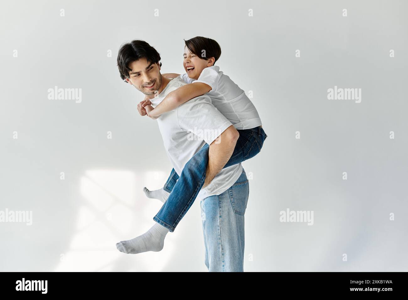 Piggyback ride father hold hi-res stock photography and images - Alamy