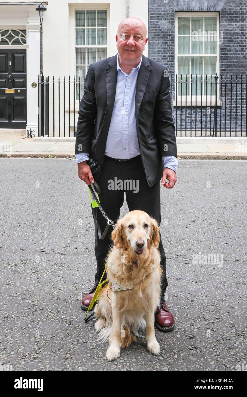 London, 22st July 2024. Steve Darling, MP, with his guide dog Jennie ...