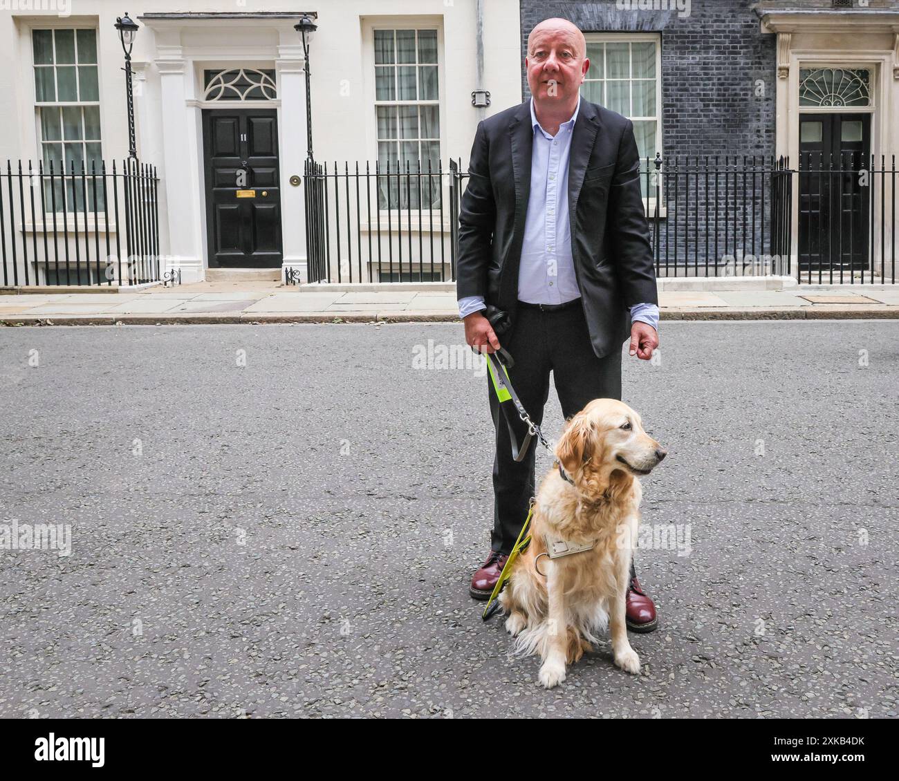 London, 22st July 2024. Steve Darling, MP, with his guide dog Jennie ...