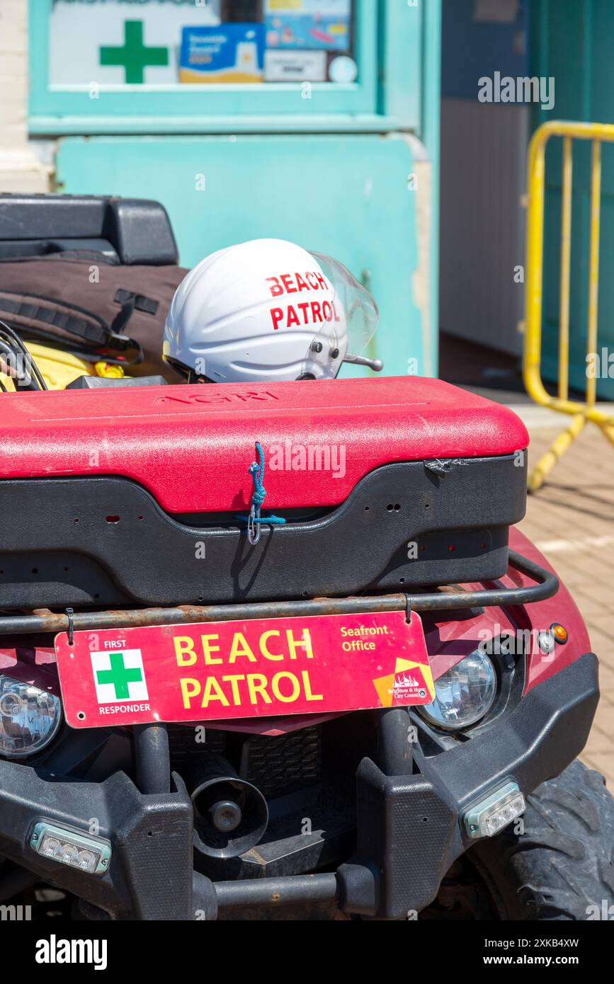 Beach patrol buggy parked outside a first aid station along the ...