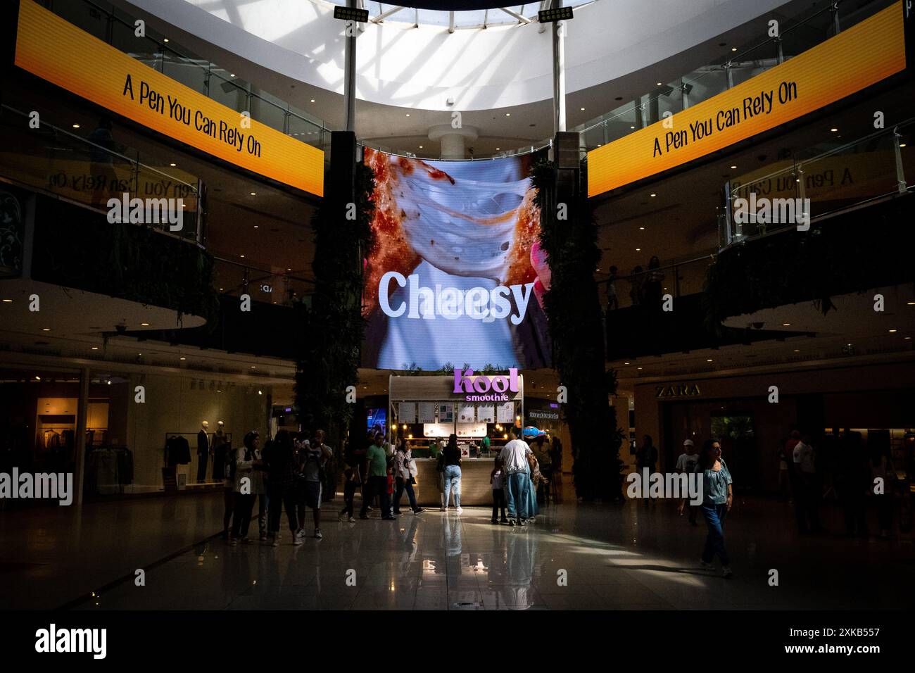 Screen advertising the fast food chain Pizza Hut in the main shopping ...