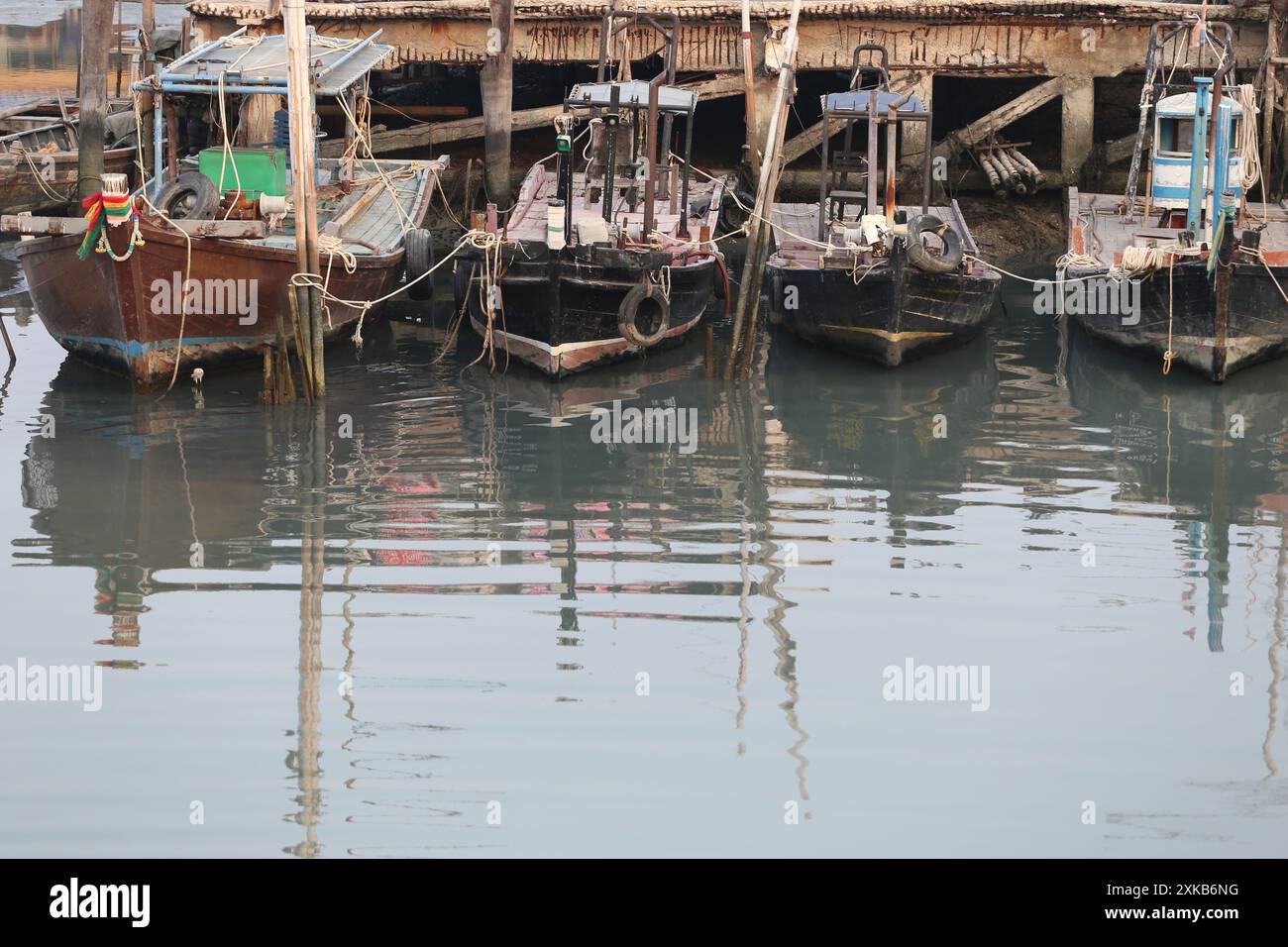 Villagers on boats hi-res stock photography and images - Alamy