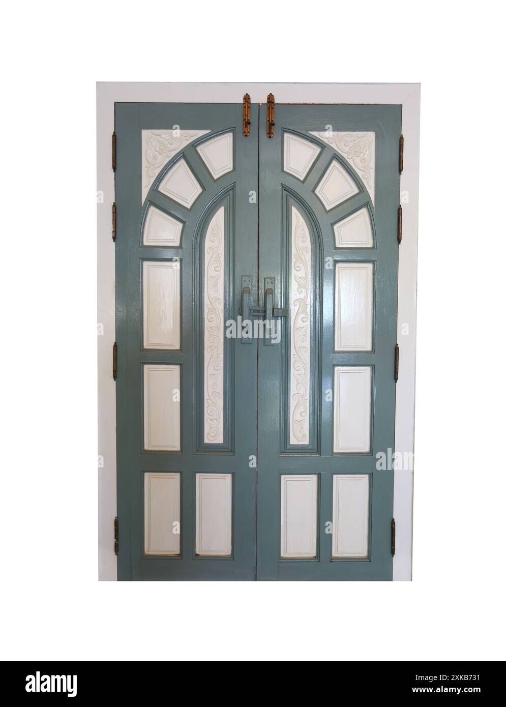 Light green wooden door with a traditional pattern isolated on white ...