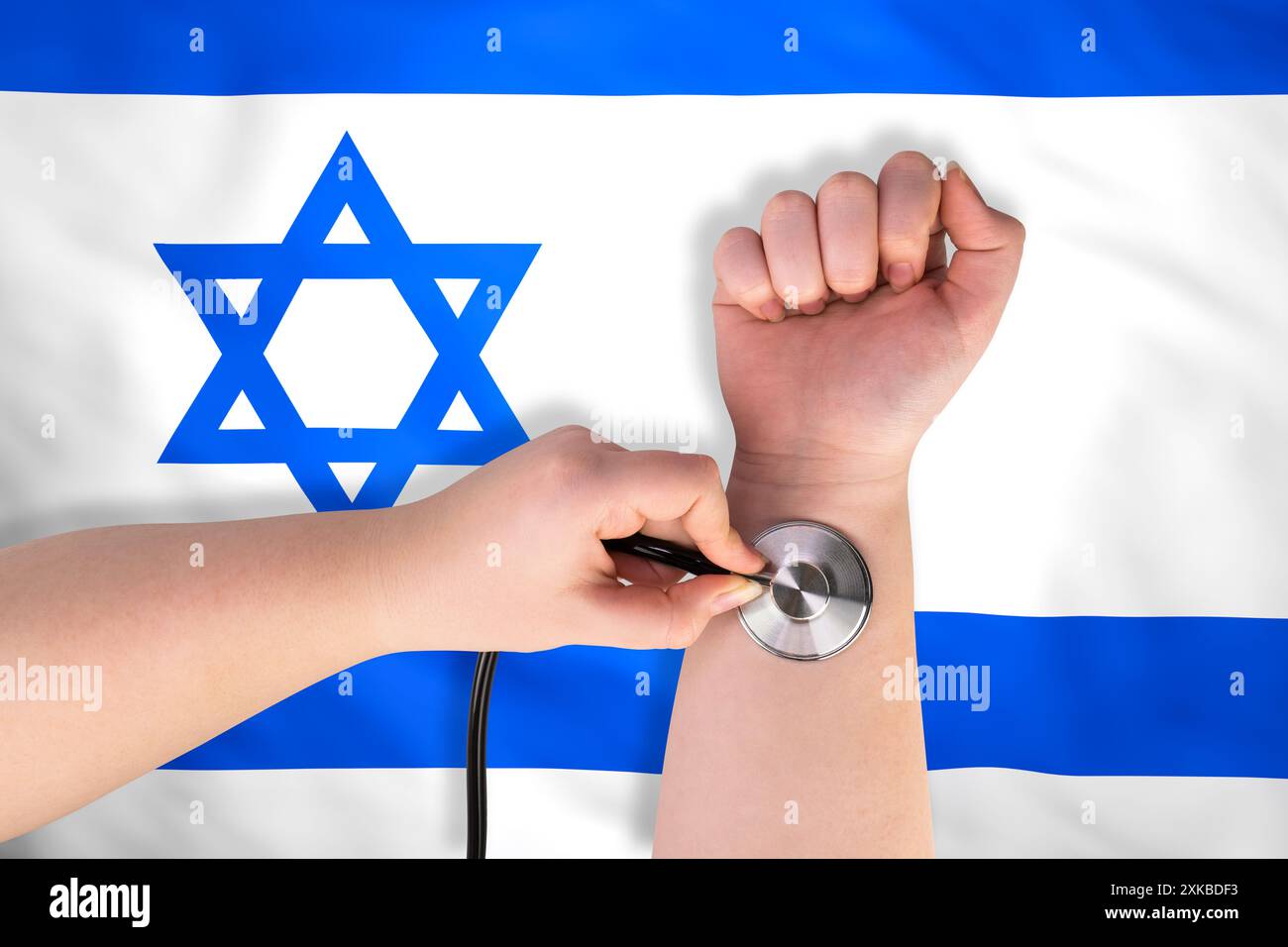 Close-up of a medical stethoscope head on a wrist with the Israeli flag ...